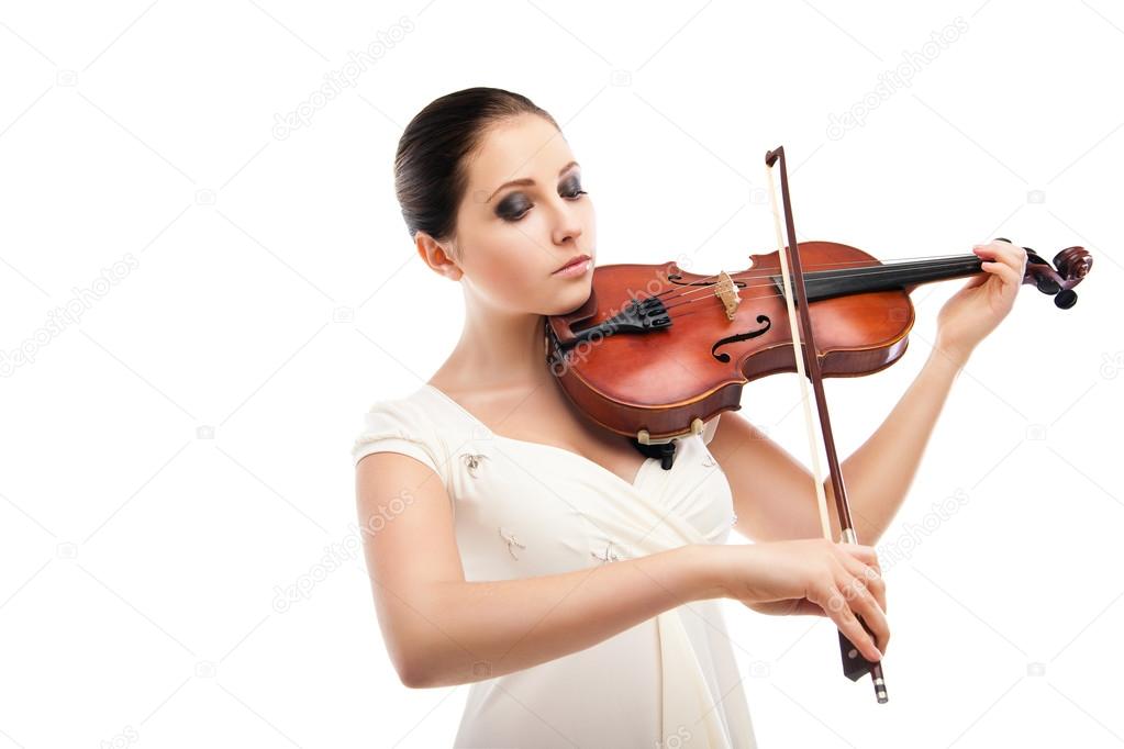 Beautiful young woman playing violin over white Stock Photo by ...