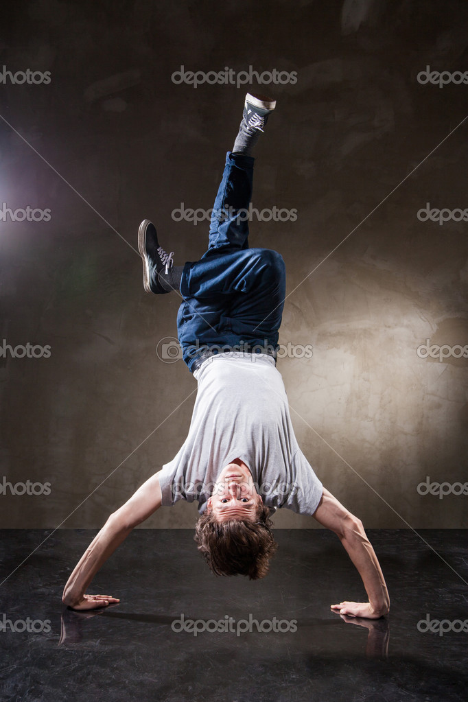 Hip hop dancer jumping and dancing Stock Photo by ©Julenochek 41968755
