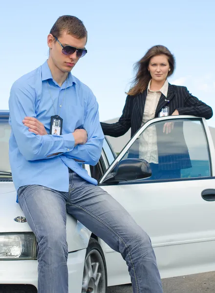 Two FBI agents near the car with flasher - Stock Image - Everypixel