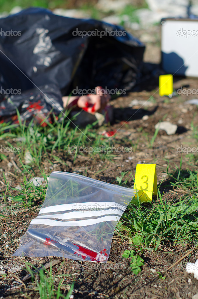 Crime scene with male corpse and evidence markers — Stock Photo ...