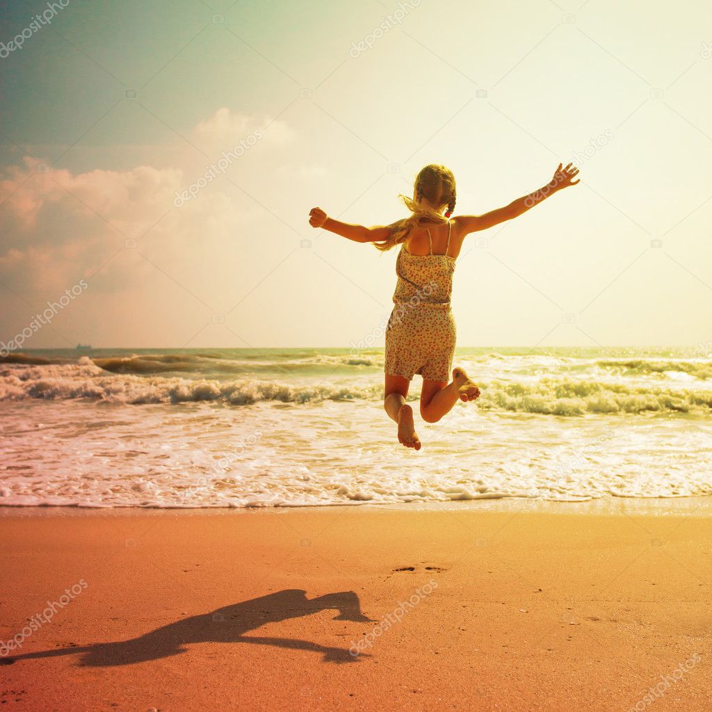 Happy child on the beach — Stock Photo © altanaka #22349705