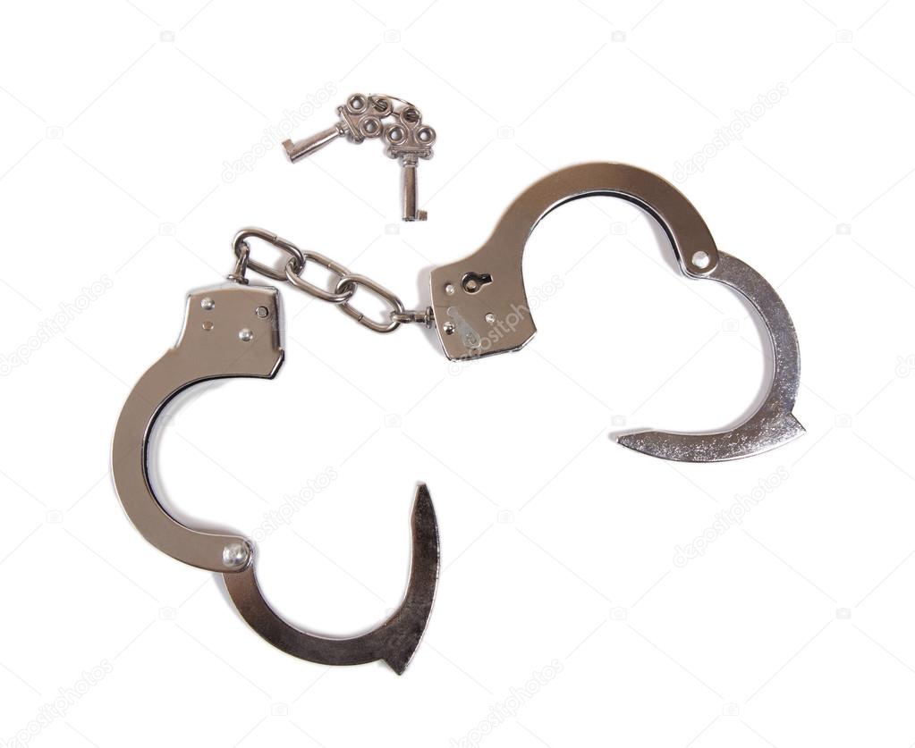 A pair of opened handcuffs with keys Stock Photo by ©Eillen_1981 32362175