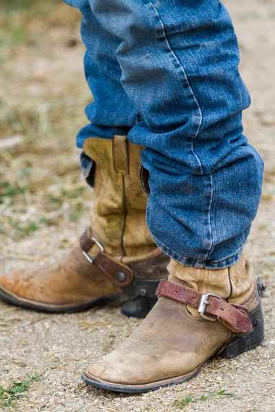 Cowboy feet crossed Stock Photos, Royalty Free Cowboy feet crossed ...