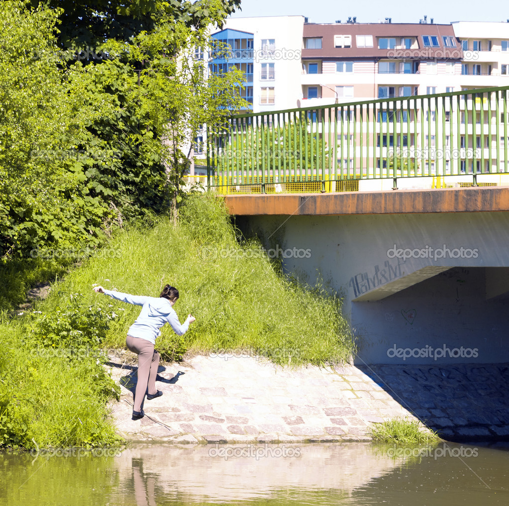 Teenage girl going under the bridge in Wroclaw, Poland — Stock Photo ...