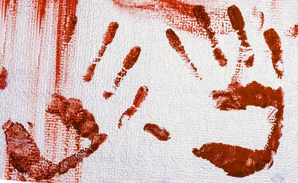 Hand prints stained with paint on the wall - Stock Image - Everypixel