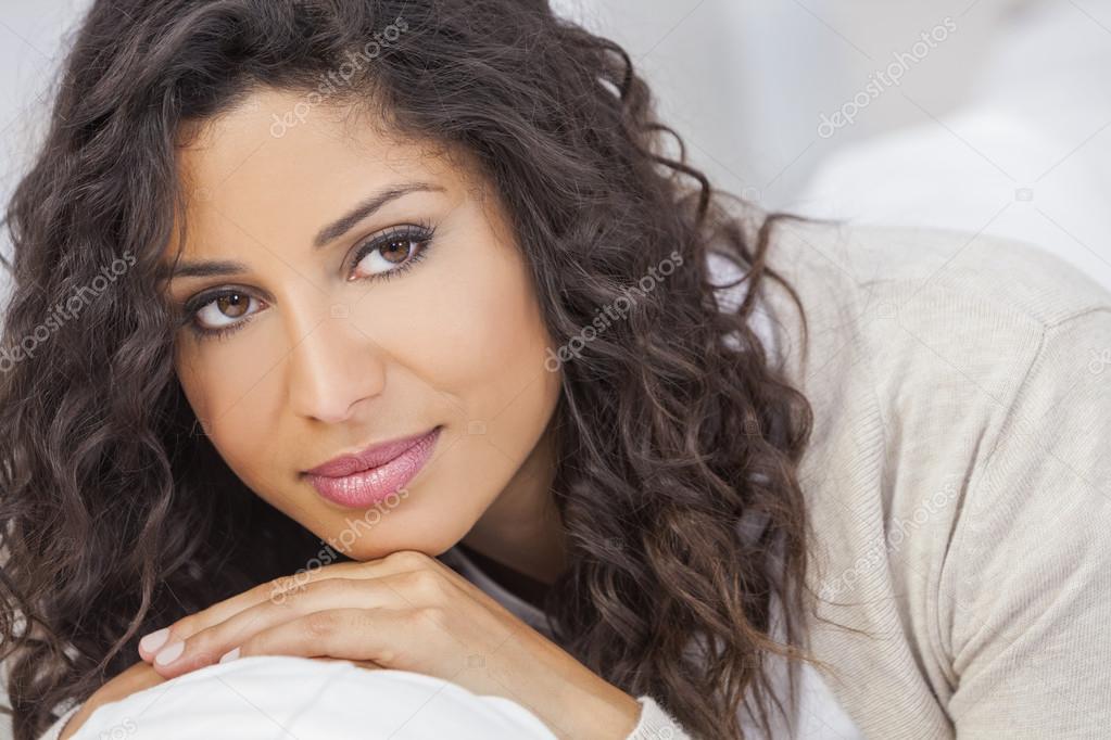 Beautiful Happy Hispanic Woman Smiling — Stock Photo © dmbaker #38622887 Beautiful Happy Hispanic Woman Smiling — Stock Photo © dmbaker #38622887
