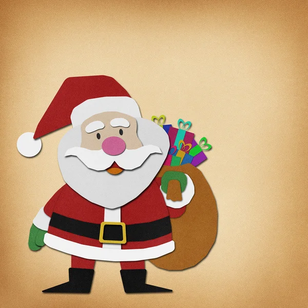 Santa claus recycled paper craft on paper background. Stock Photo by ...