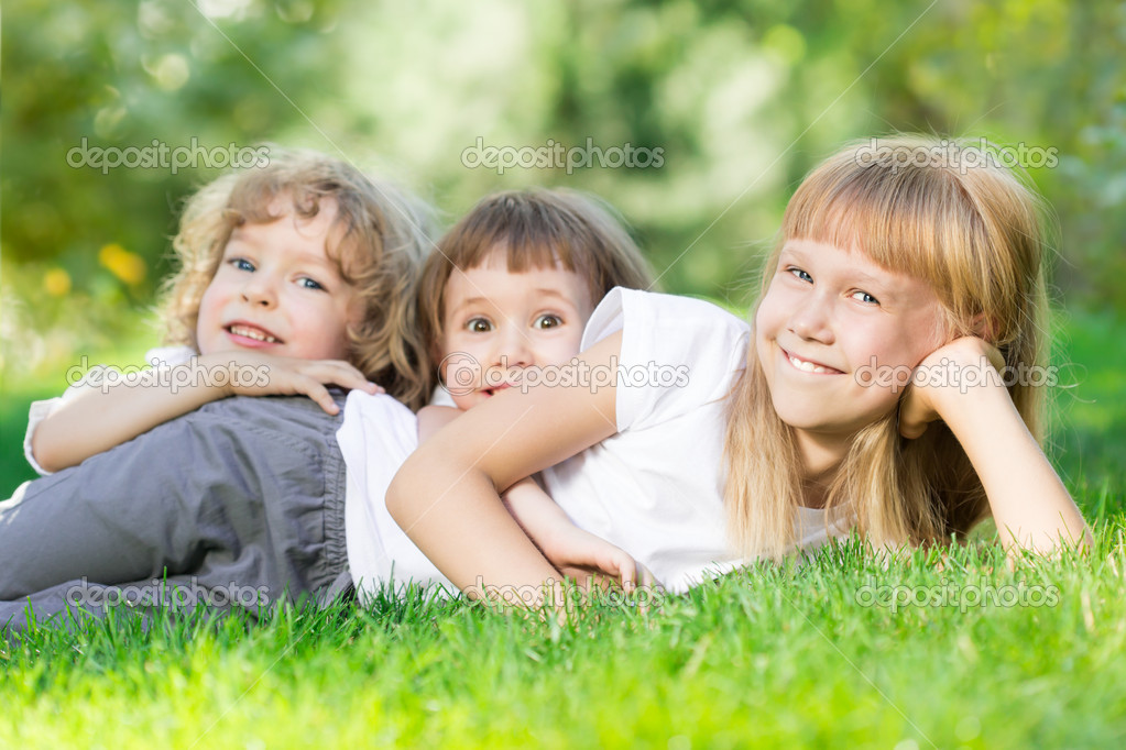 Kids in spring park Stock Photo by ©Yaruta 21385101