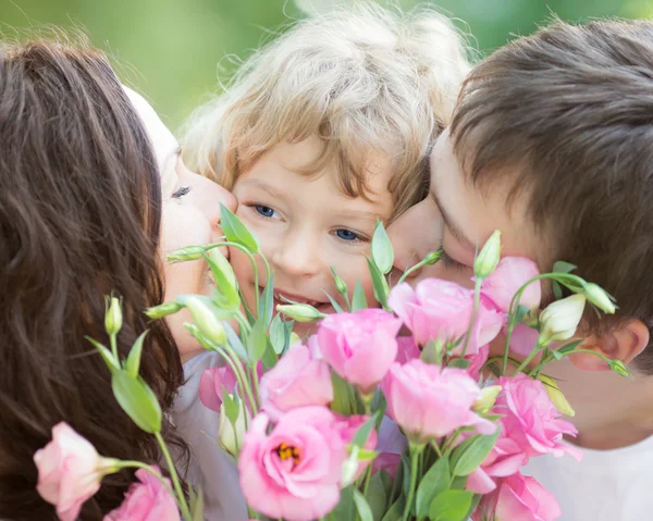Woman and child holding bouquet of flowers Stock Photo by ©Yaruta 21385171