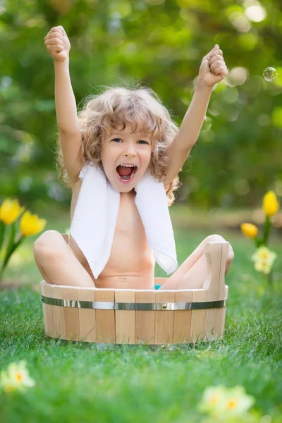 Child bathing outdoors Stock Photos, Royalty Free Child bathing ...
