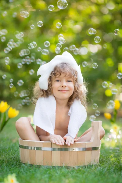Child bathing outdoors Stock Photos, Royalty Free Child bathing ...