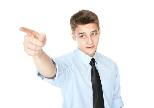 Young smiling businessman pointing finger isolated on white — Stock ...
