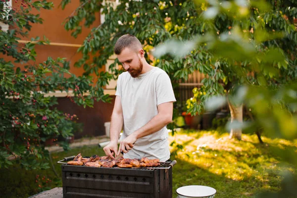 Man cooking bbq Stock Photos, Royalty Free Man cooking bbq Images ...