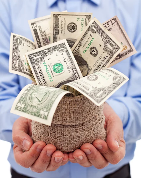 Incentive for businessman - bag full of dollar banknotes - Stock Image ...