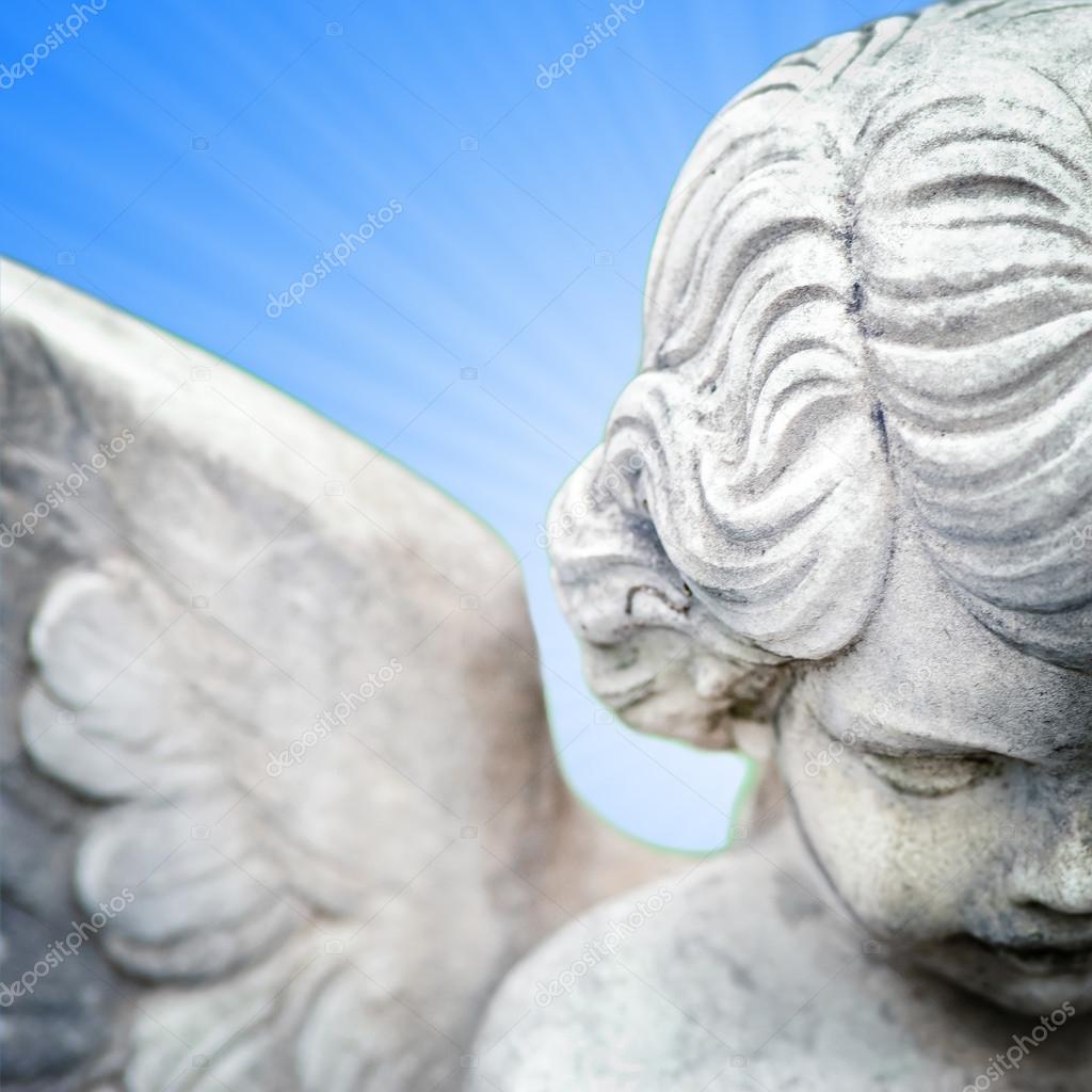 Angel on blue background Stock Photo by ©leporiniumberto 13187543