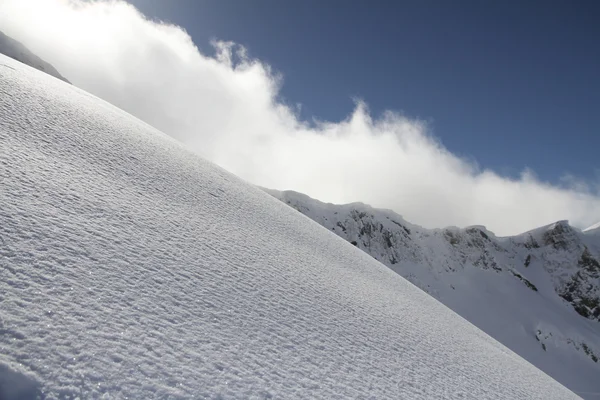 Ski slope in powder snow, mountain landscape — Stock Photo © wasja ...