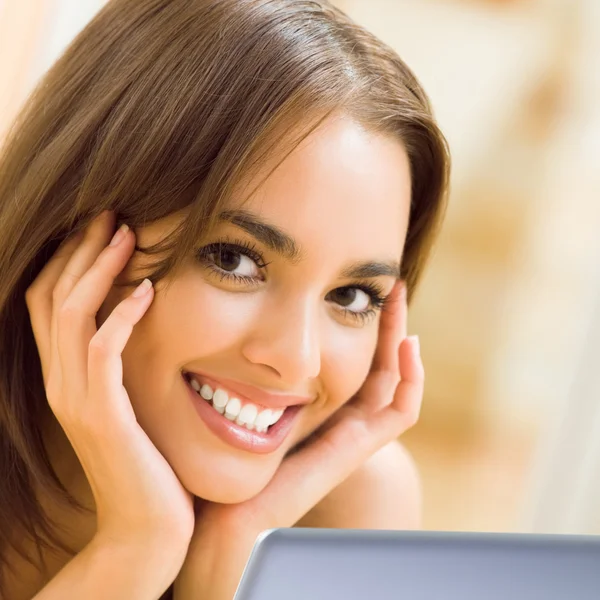 Cheerfull smiling woman working with laptop - Stock Image - Everypixel