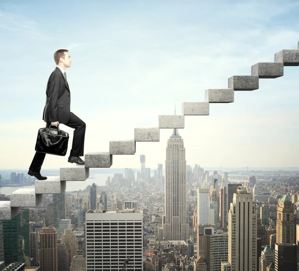 stepping up a staircase - Stock Image - Everypixel