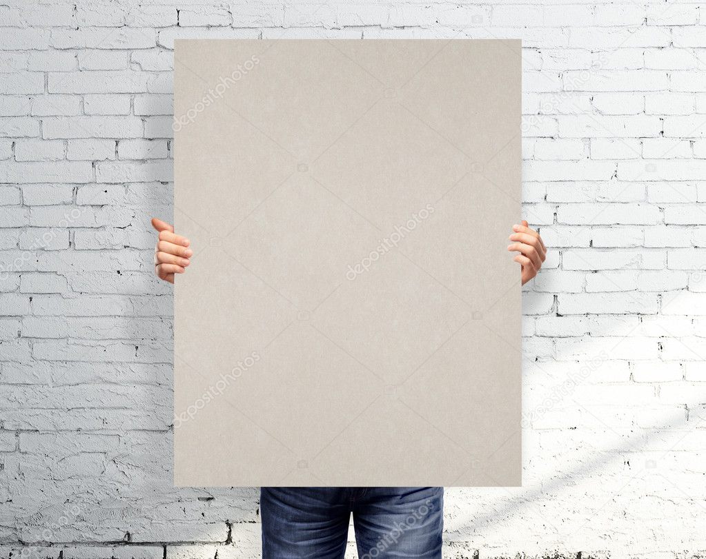Men holding poster Stock Photo by ©peshkova 20051109