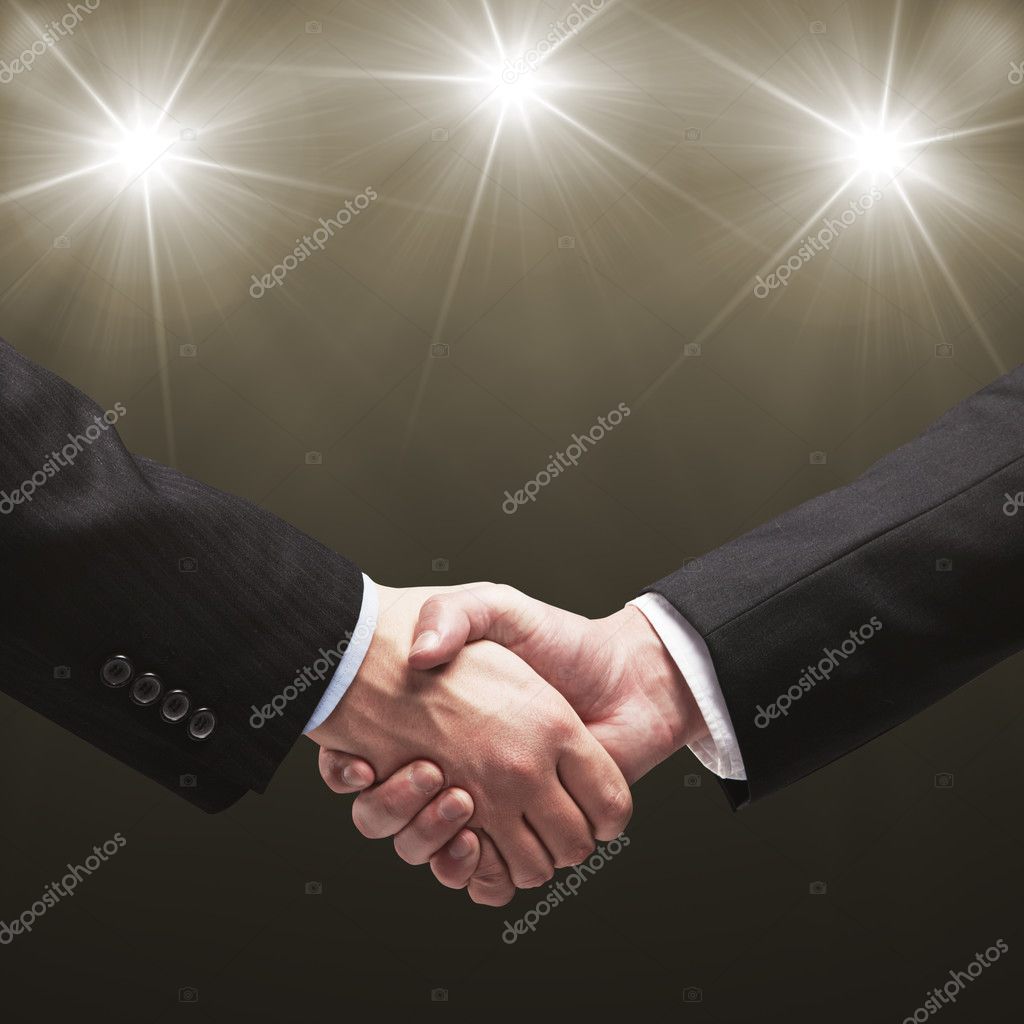 Handshake and lamps Stock Photo by ©peshkova 22532325