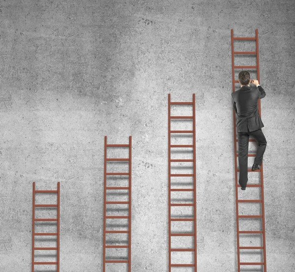 Man climbing ladder Stock Photos, Royalty Free Man climbing ladder ...