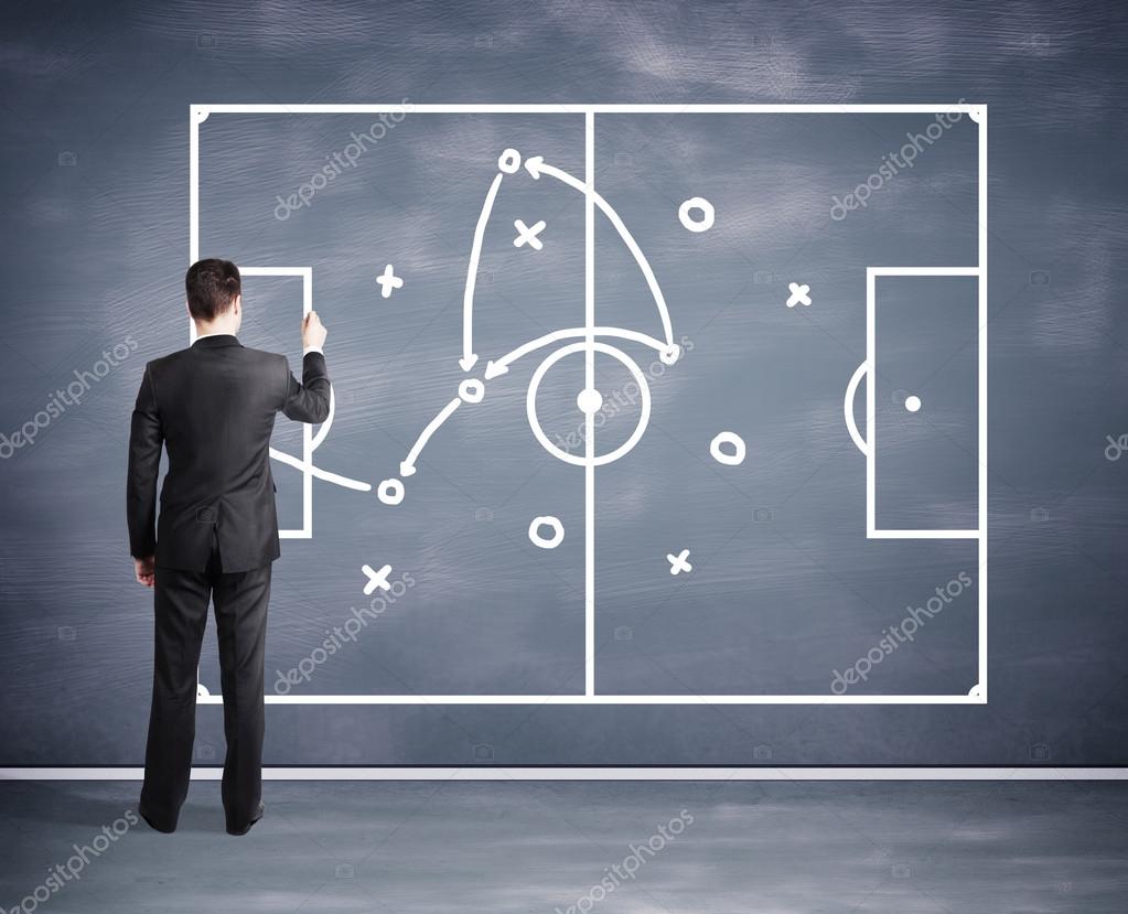 Man drawing tactic scheme — Stock Photo © peshkova #23014410