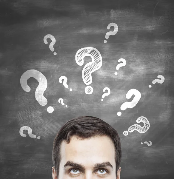 Man with question mark Stock Photo by ©peshkova 13709997