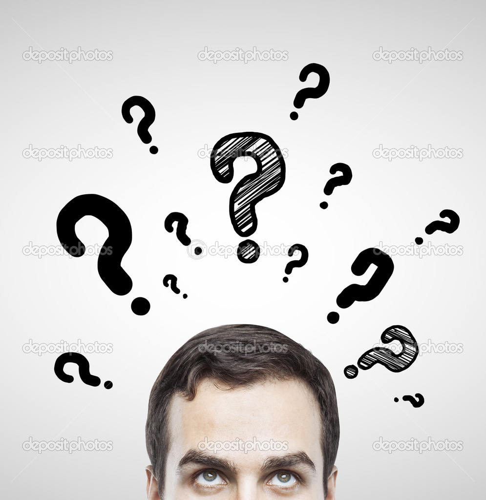 Man with questions symbol — Stock Photo © peshkova #23971325