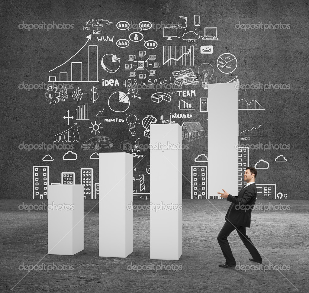 Businessman holding colum — Stock Photo © peshkova #23971369