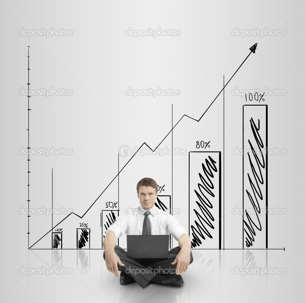 Man and graph on wall Stock Photo by ©peshkova 25033001