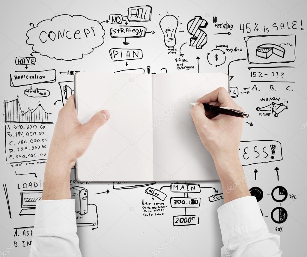 Hands drawing in book Stock Photo by ©peshkova 29703047