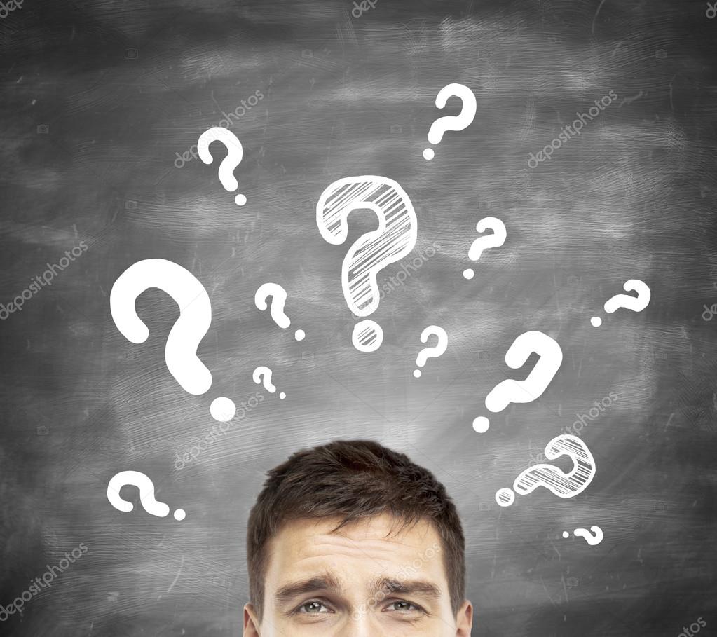 Businessman with question mark Stock Photo by ©peshkova 29703121
