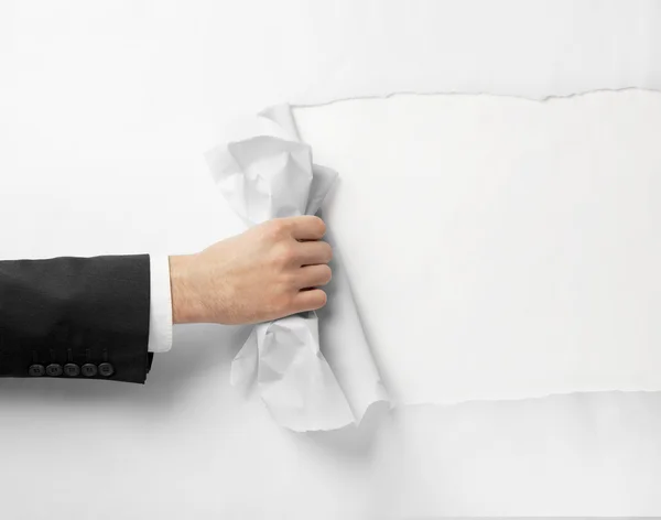 Hand tears paper Stock Photo by ©peshkova 36528959