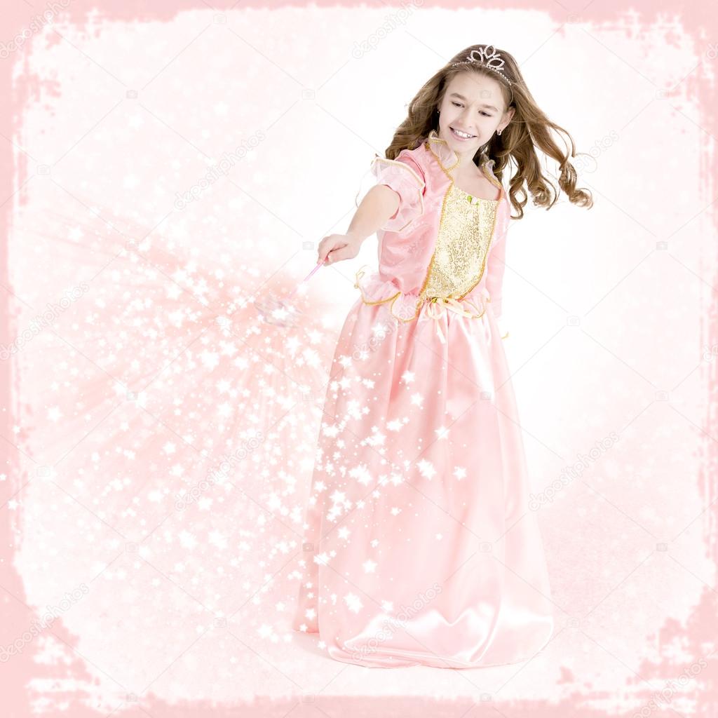 Young girl dressed as a princess with magic wand — Stock Photo ...