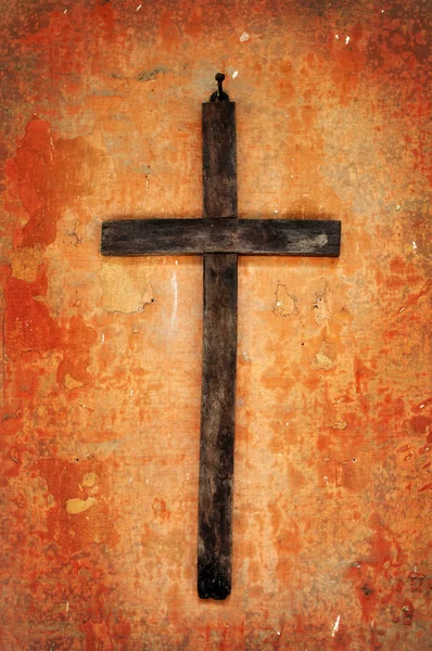 Cross on wall background Stock Photo by ©motorolka 30603907