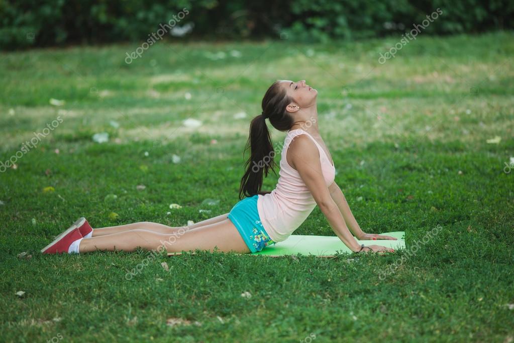 Young girl bends her back — Stock Photo © NikitaN #29693101