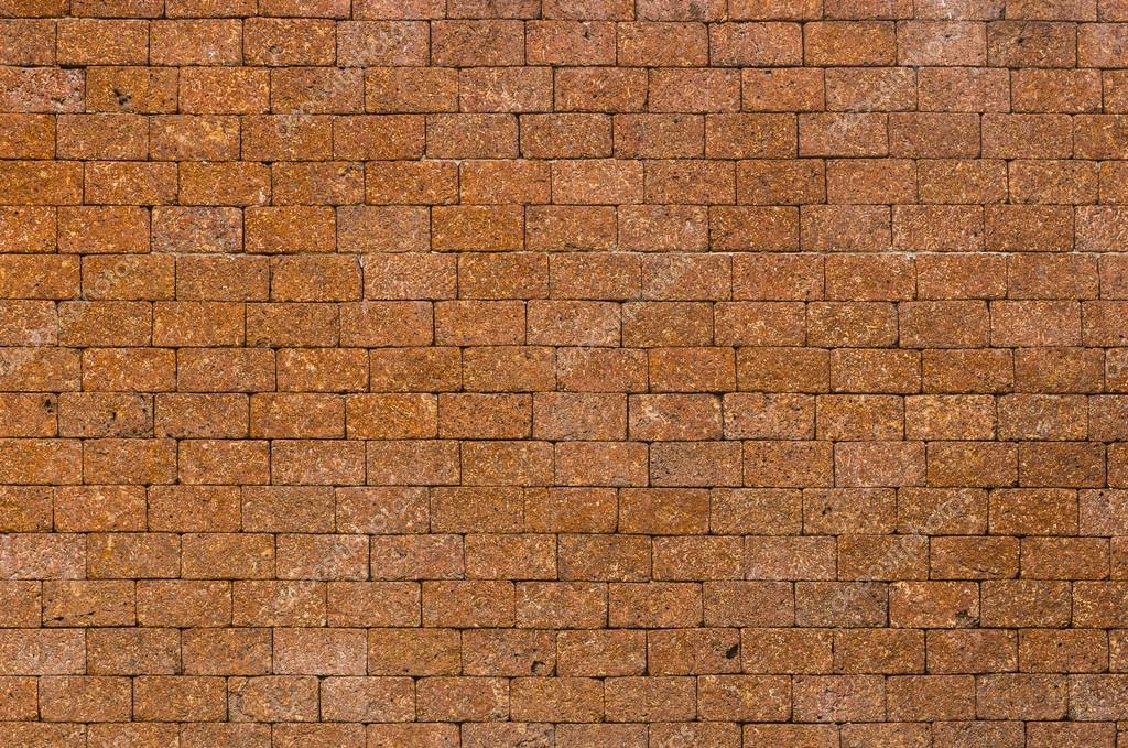 Red color of decorative laterite stone wall surface — Stock Photo ...