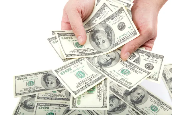 Beautiful female hand holding a stack of banknotes isolated on a Stock ...