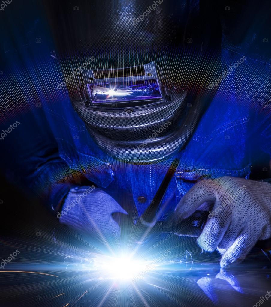 Worker welding the steel part — Stock Photo © anekoho #31176509
