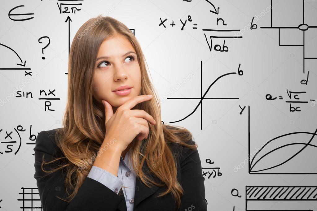 Woman resolving a complex problem Stock Photo by ©minervastock 35658007