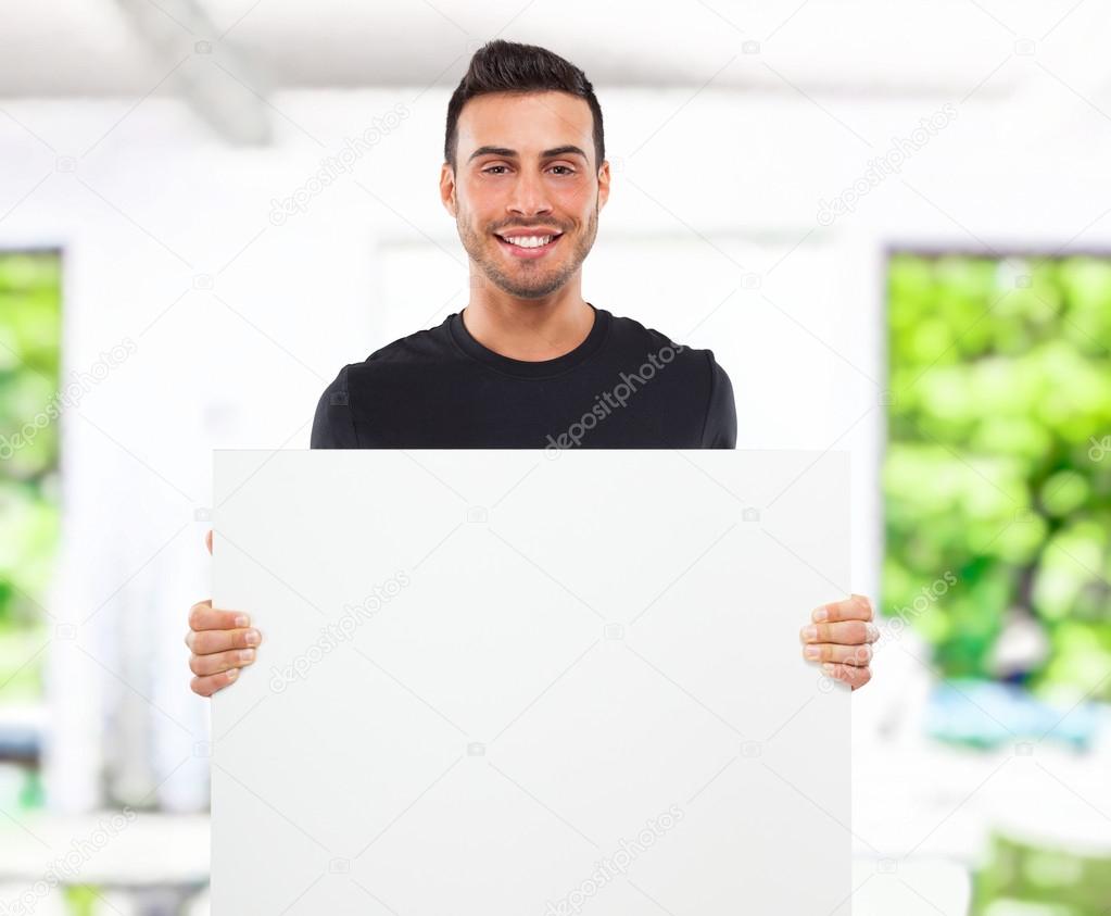 Man showing a blank sign — Stock Photo © minervastock #38775403