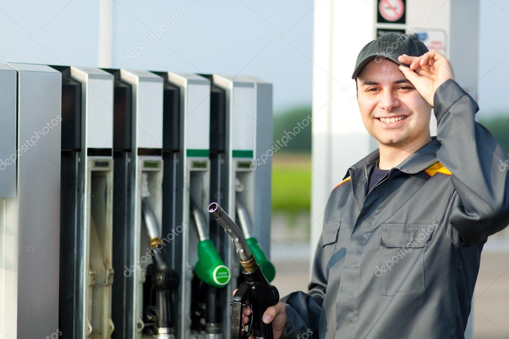Worker at gas station Stock Photo by ©minervastock 47779367