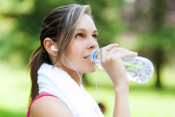 Woman refreshing after running - Stock Image - Everypixel