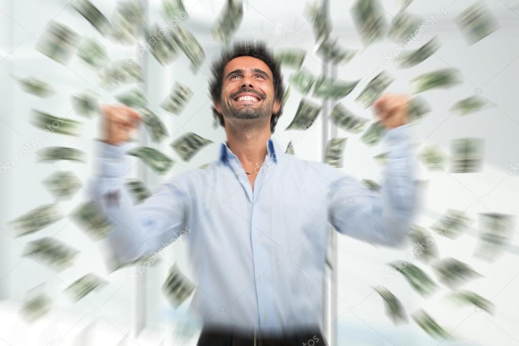 Man in a rain of money — Stock Photo © minervastock #48100505