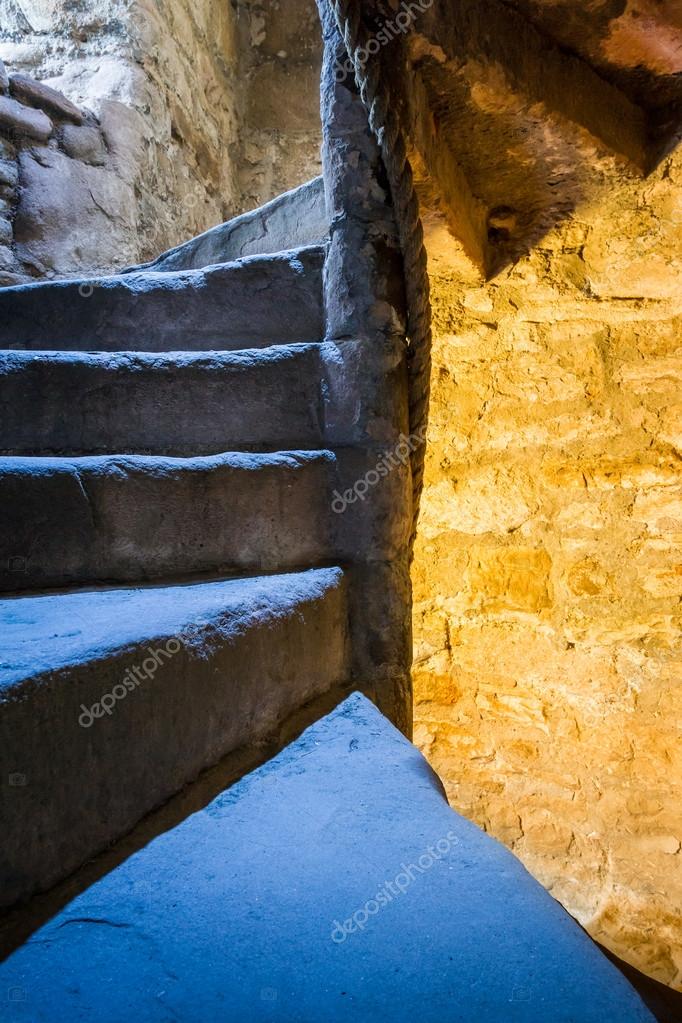 Stone Spiral Stairway with warm and cold light Stock Photo by ...