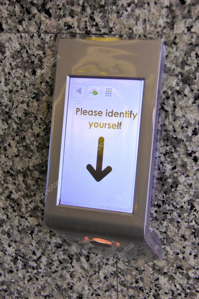 Scanner machine with "please identify yourself" Stock Photo by ...