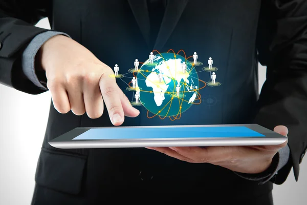 Business man using a touch screen device with social network (El ...