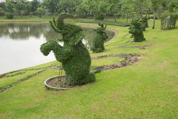 The Bending tree of elephant in garden — Stock Photo © jcsmilly #50785107