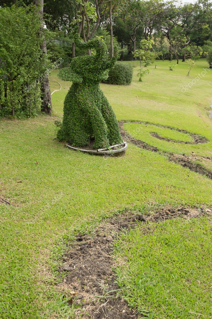 The Bending tree of elephant in garden — Stock Photo © jcsmilly #50785107