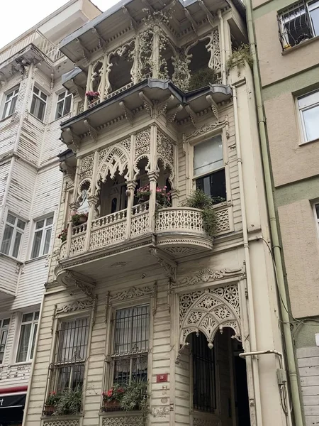 Old european buildings facade with fretwork. Closeup of the of a ...